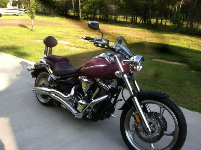 2010, 1800 yamaha raider,vince&hines custom pipes,black,wide rear tire.