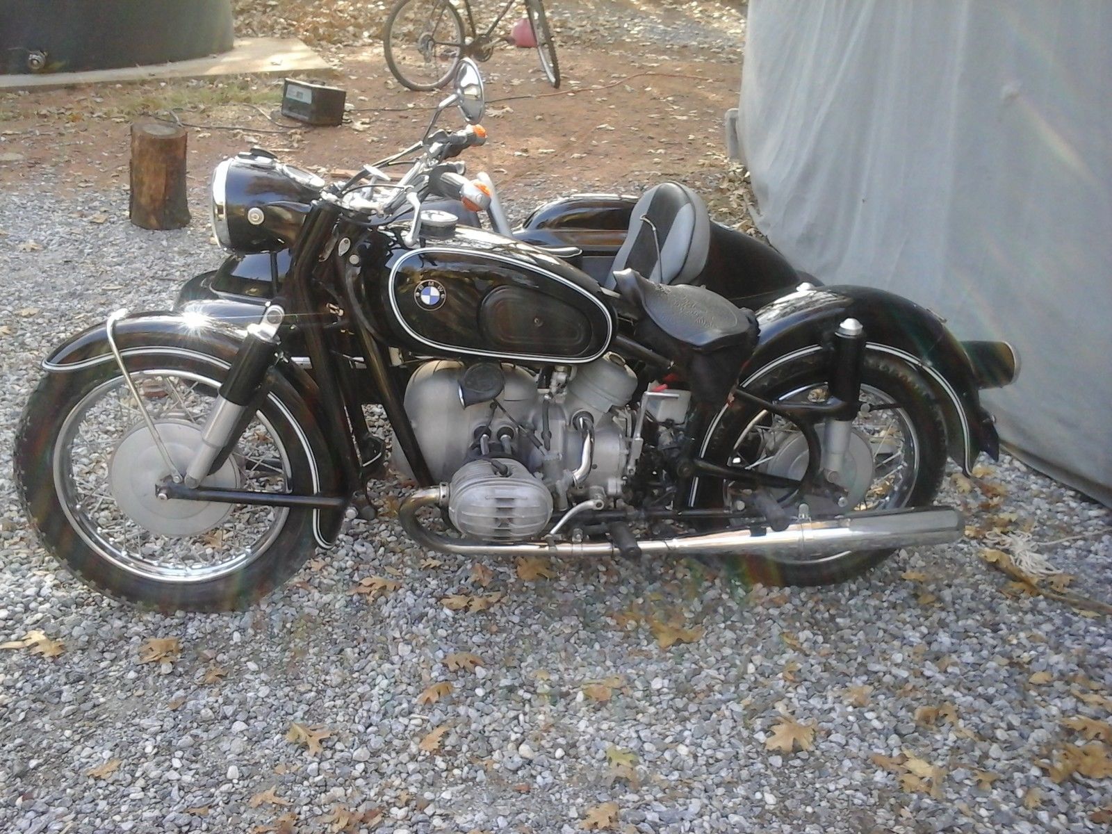 a beautiful 1969 bmw r60 motorcycle with a valorex sidecar