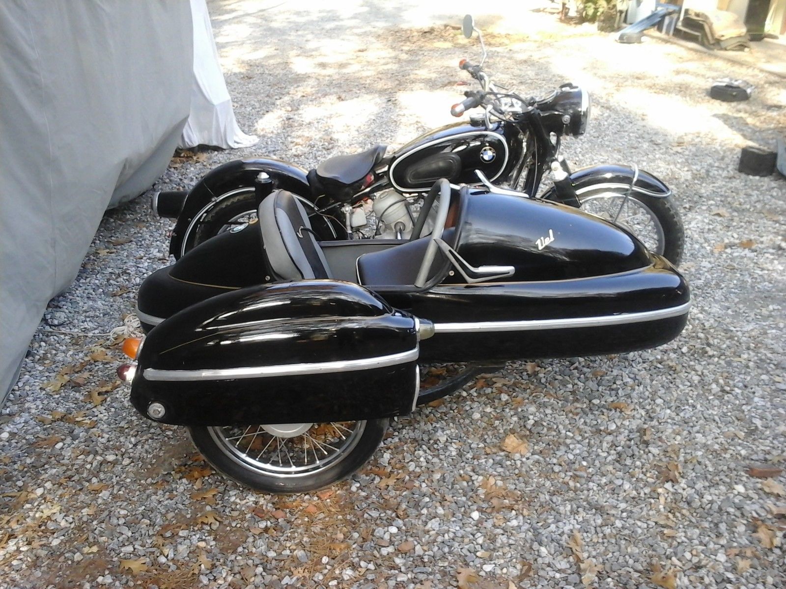 a beautiful 1969 bmw r60 motorcycle with a valorex sidecar